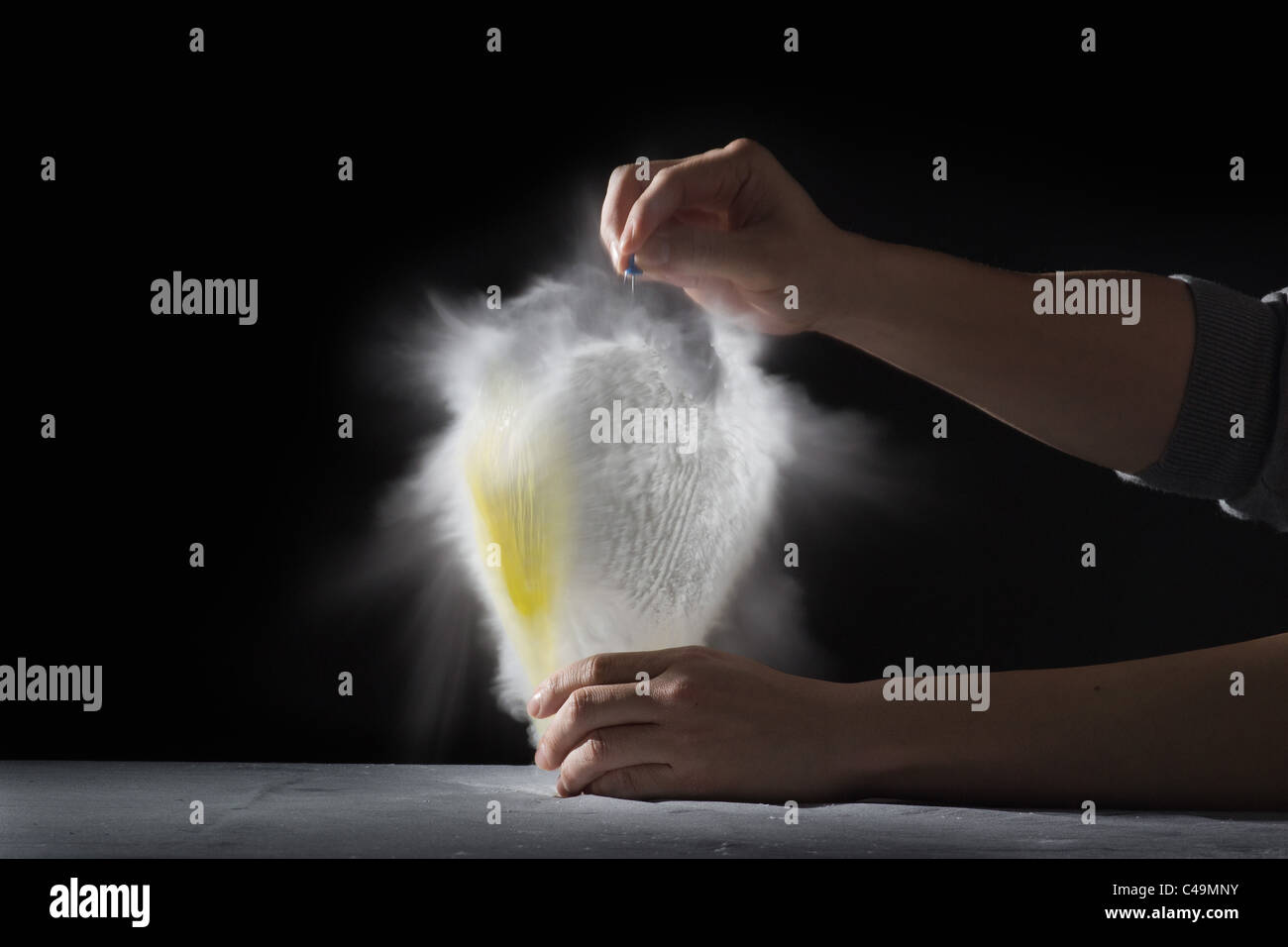 high speed flash capturing bursting balloon and visible sound wave ...