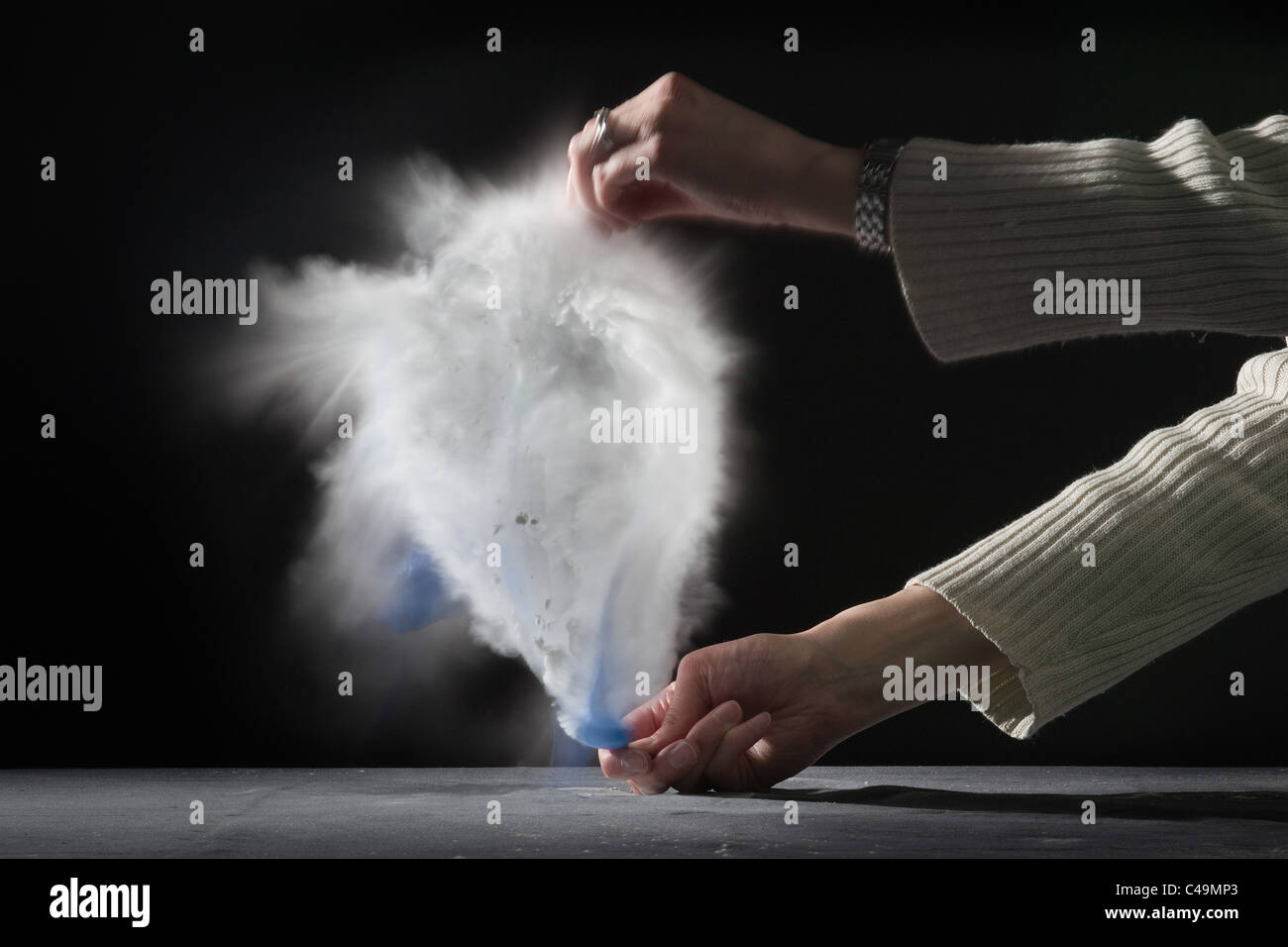 high speed flash capturing bursting balloon and visible sound wave ...
