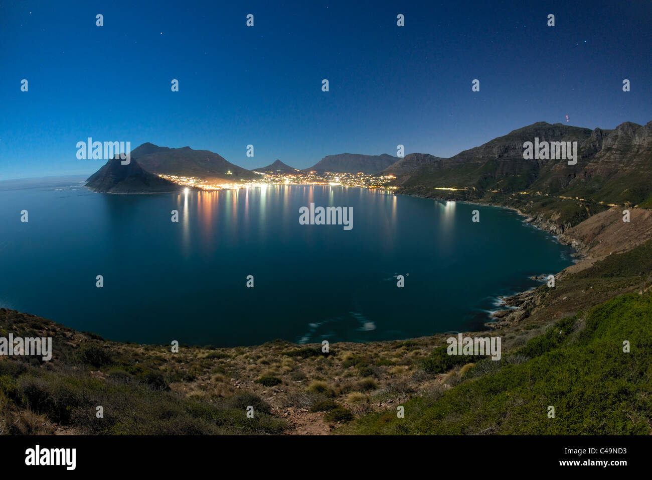 Night-time, moonlit view of Hout Bay from Chapman's Peak Drive in Cape ...