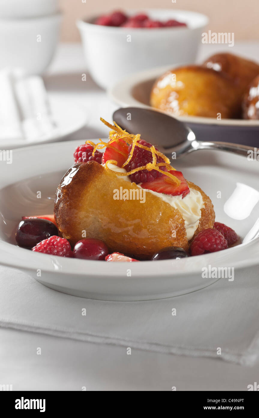Rum babas dessert Stock Photo - Alamy