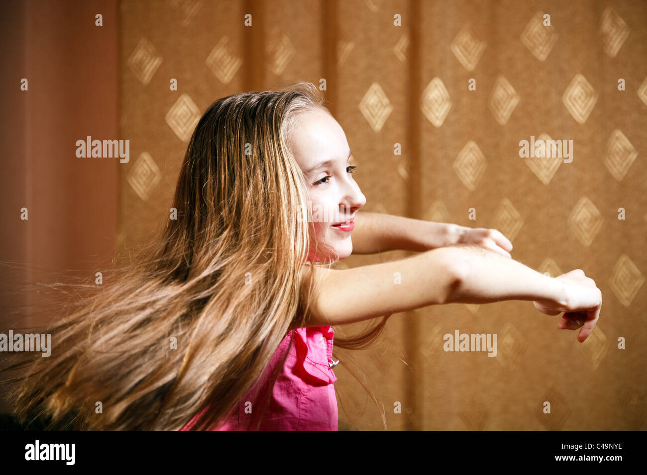 Long-hair girl dancing Stock Photo - Alamy