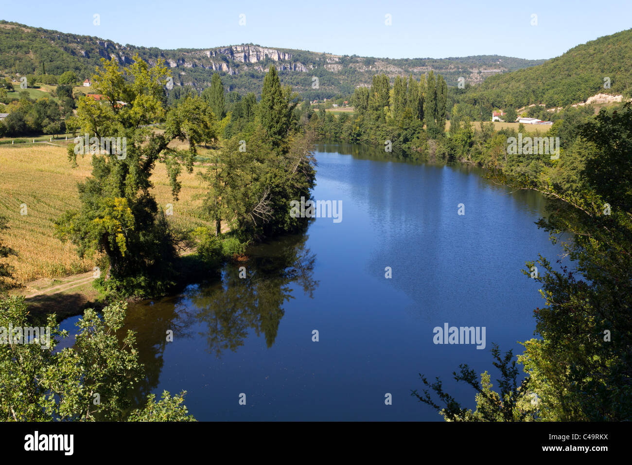 The peaceful River Lot flowing through rural countryside near Cajarc ...