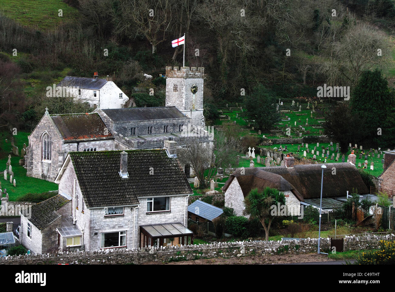 Part of the village of Upwey, Dorset, showing the church with the St ...