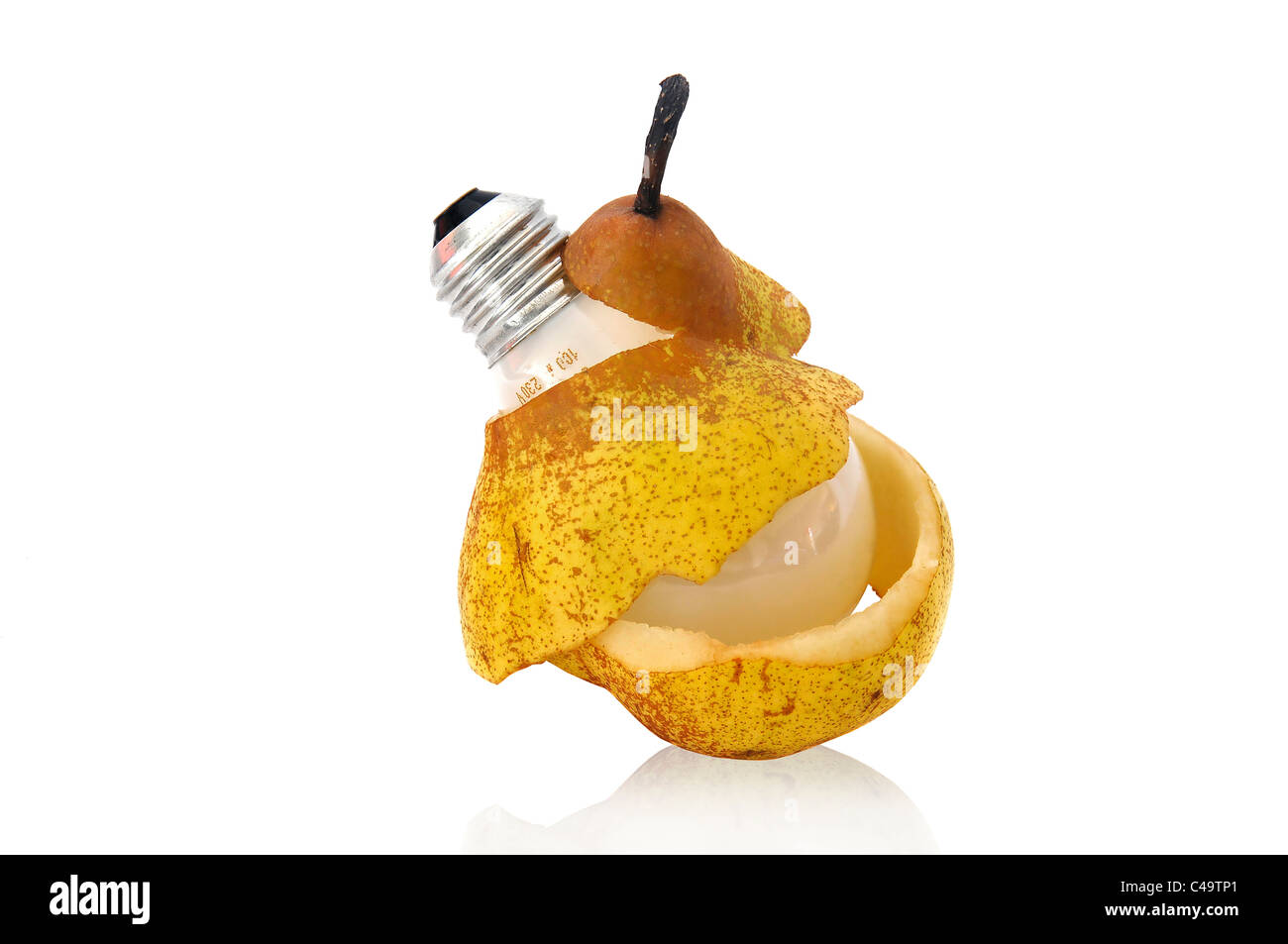 Pear with light-bulb isolated in white Stock Photo - Alamy