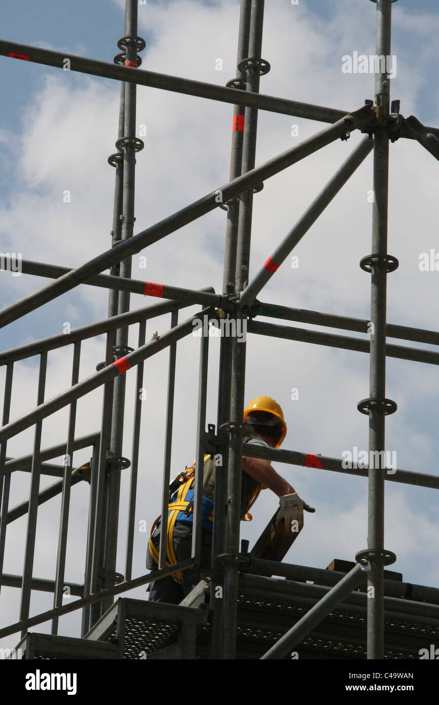 worker on scaffolding in italy Stock Photo - Alamy