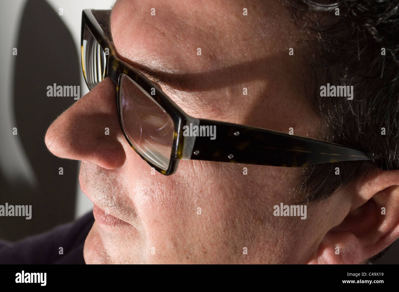 close up of man face with glasses Stock Photo - Alamy