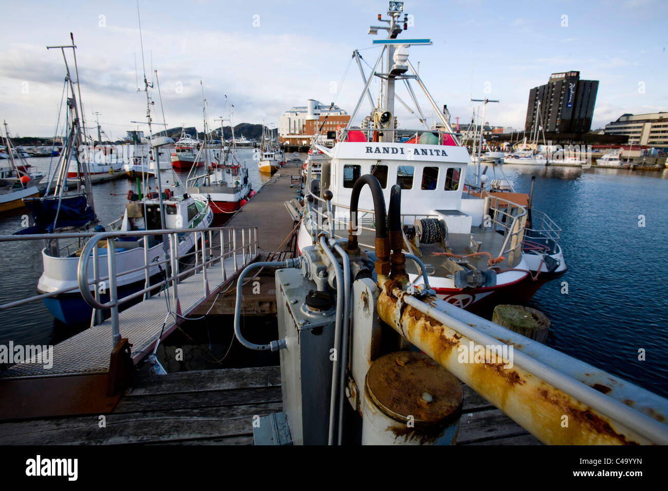 Photograph of Norwegian fishing boats in a small sea port Stock Photo ...