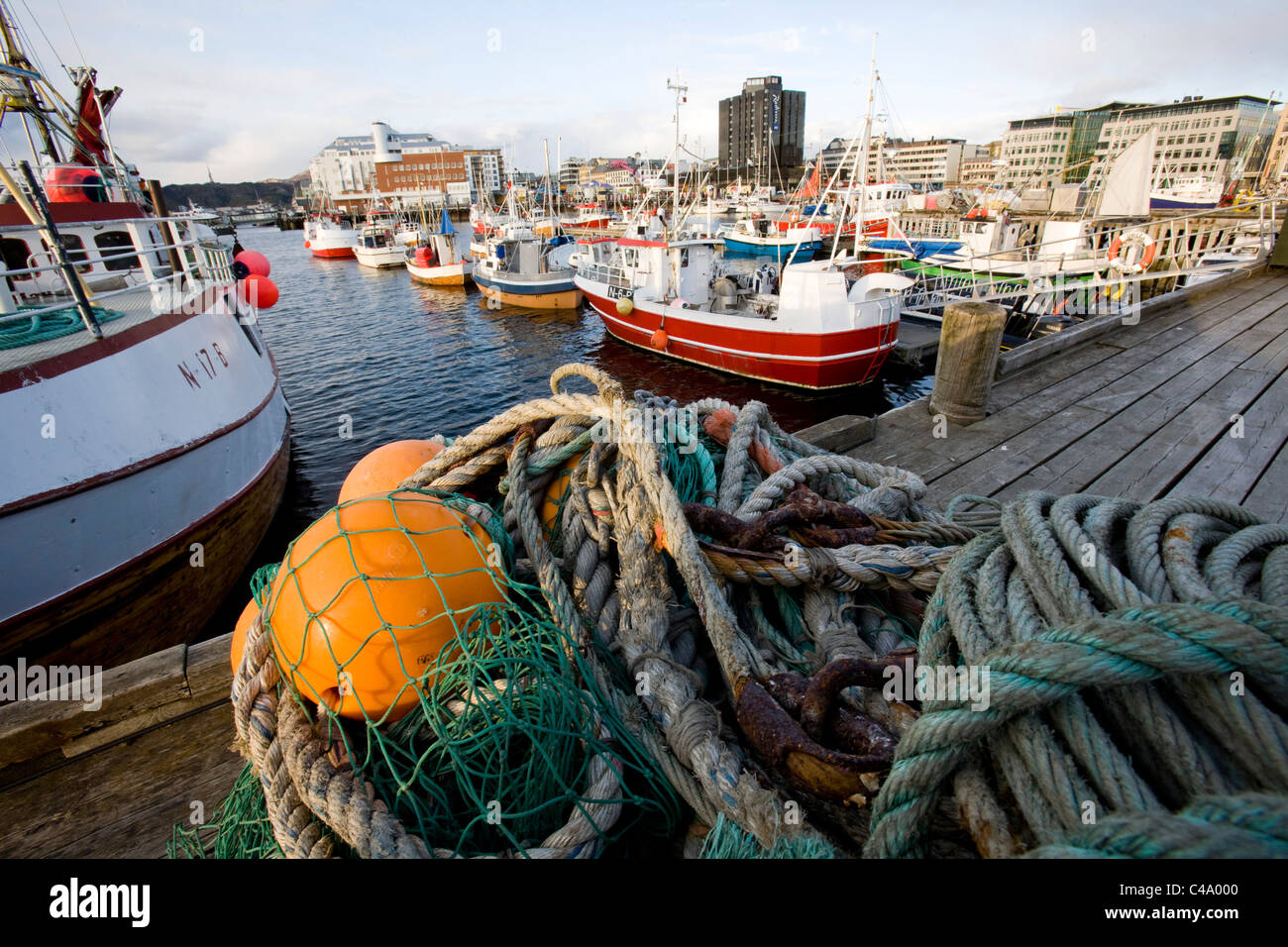 Photograph of Norwegian fishing boats in a small sea port Stock Photo ...