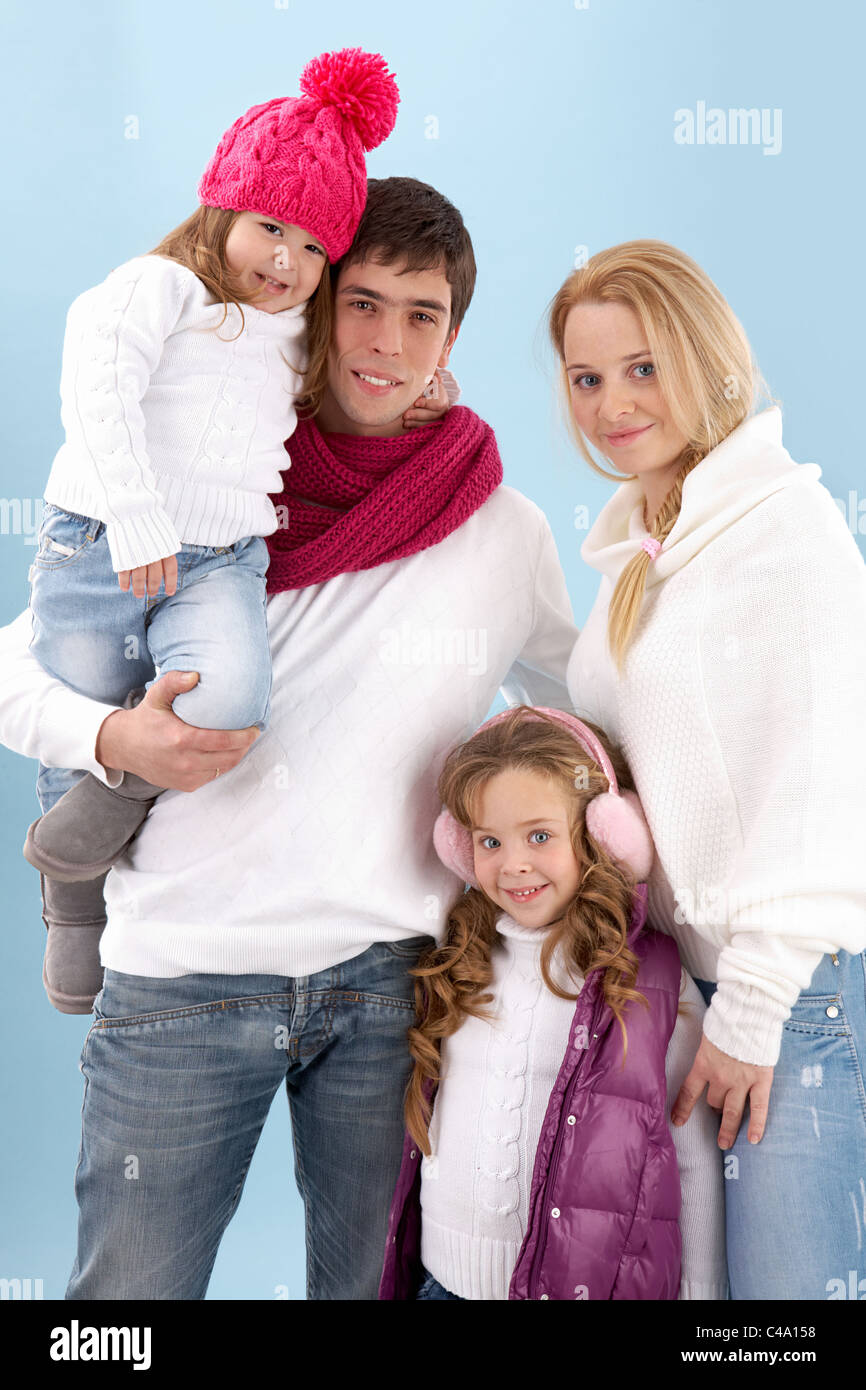 Happy family members looking at camera with smiles Stock Photo - Alamy