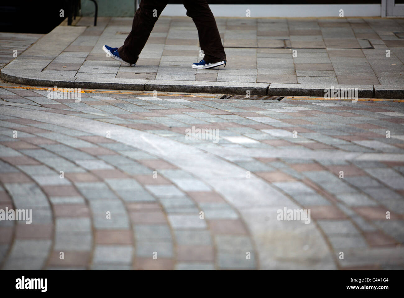 Walking along the pavement hi-res stock photography and images - Alamy