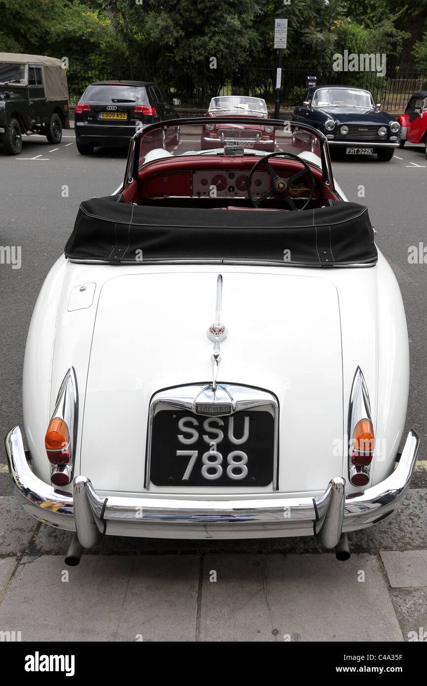 A wonderful and pristine example of an Jaguar XK 150 viewed from a rear ...