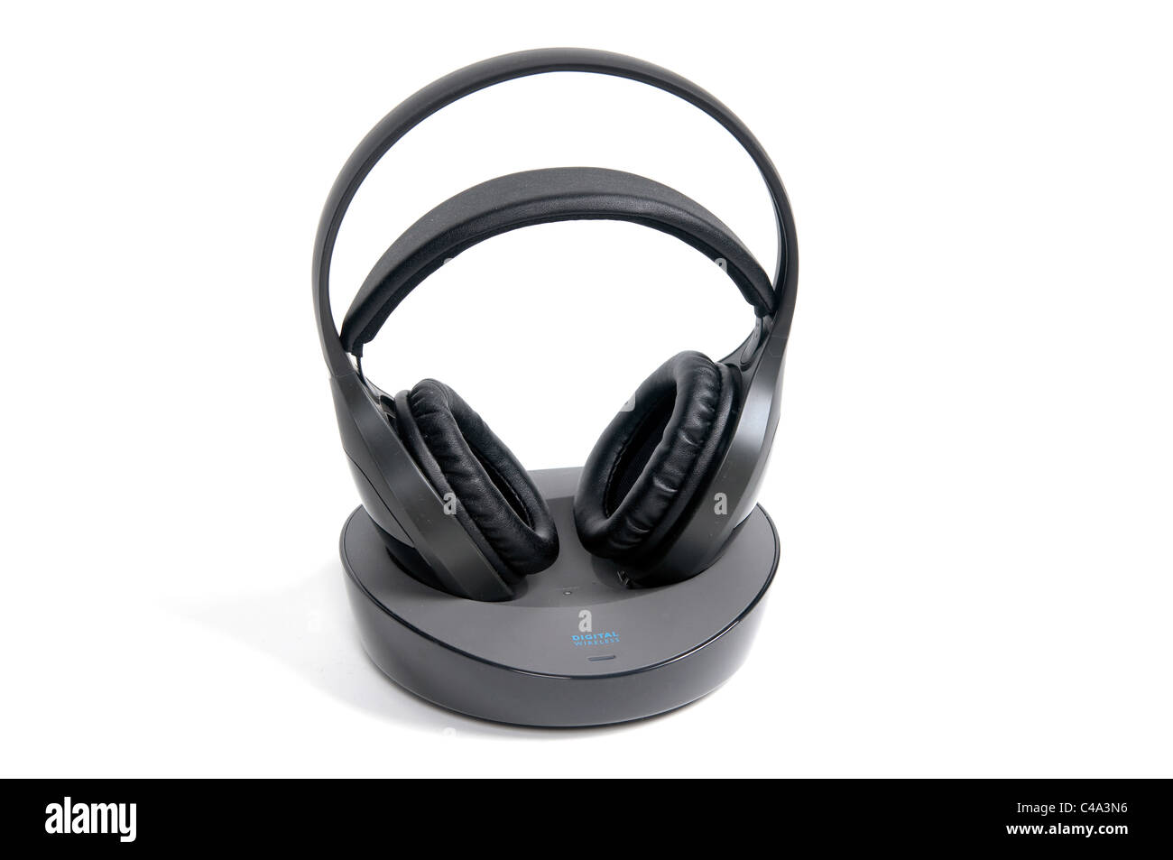 Wireless headphones with base isolated on white background Stock Photo ...