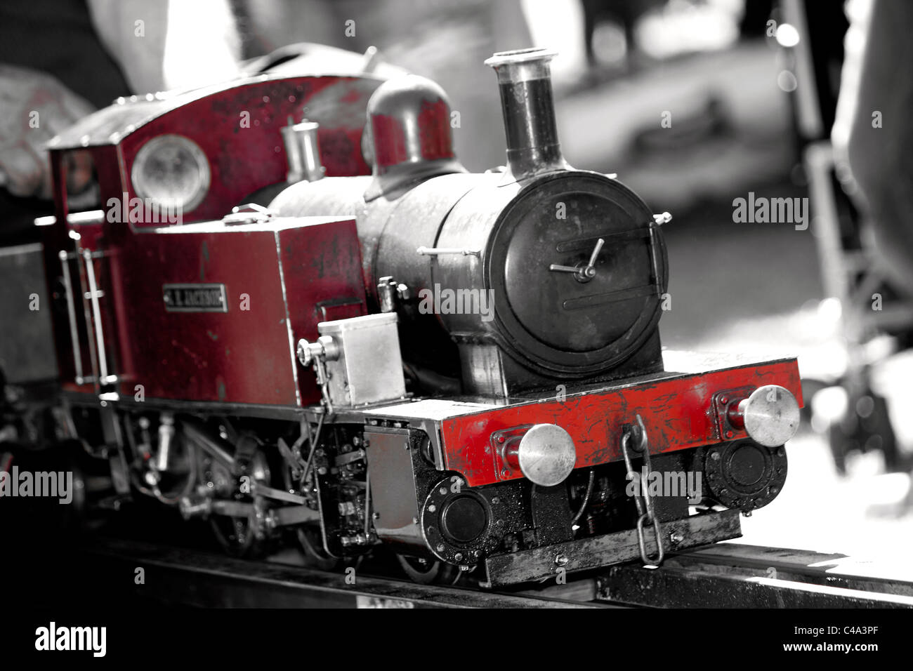 A model sit on steam train for rides at a local fair in the summer time ...