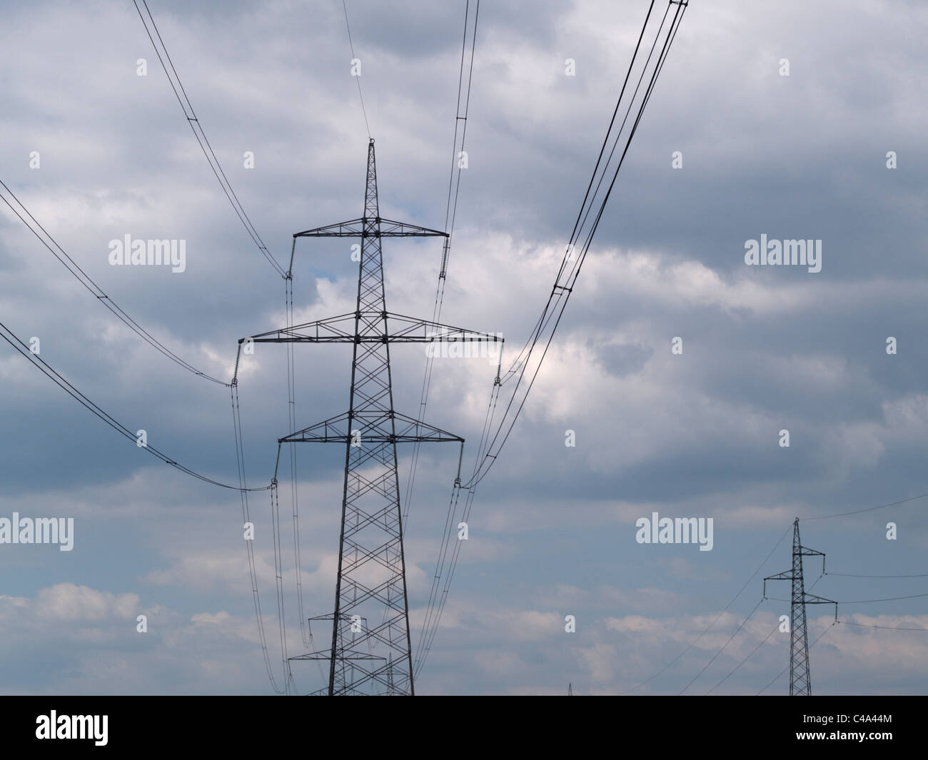 Utility pole in front of a dramatic sky Stock Photo - Alamy