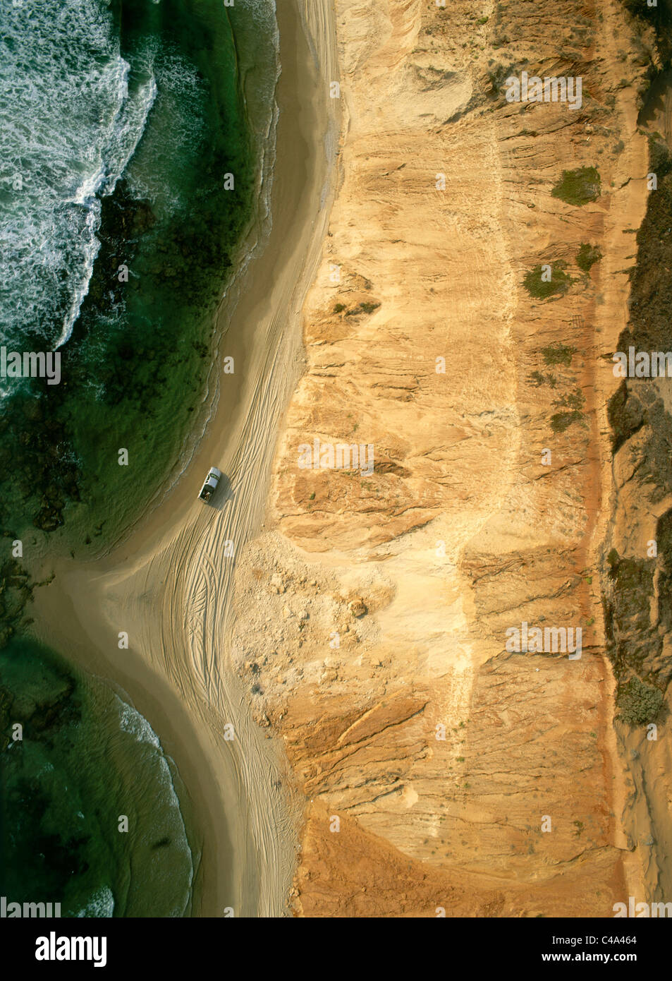Aerial photograph of an ATV driving on the beach near Ga'ash Stock ...