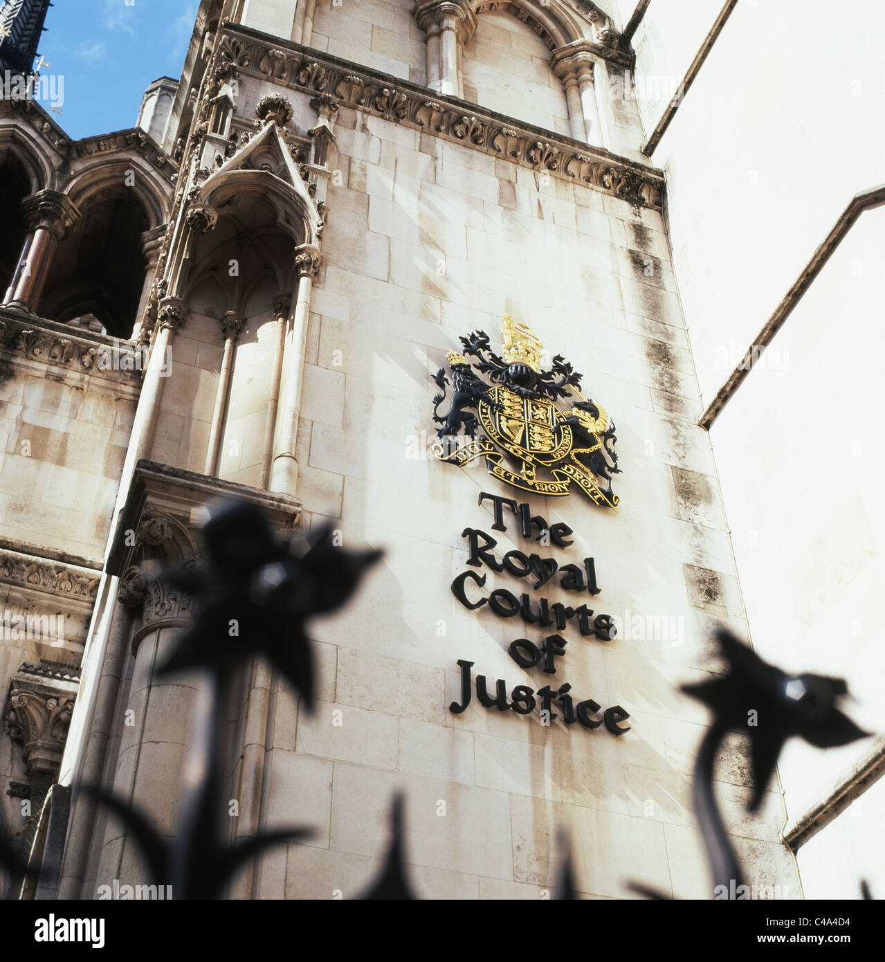 The Royal Courts of Justice sign and the exterior flower design of the ...