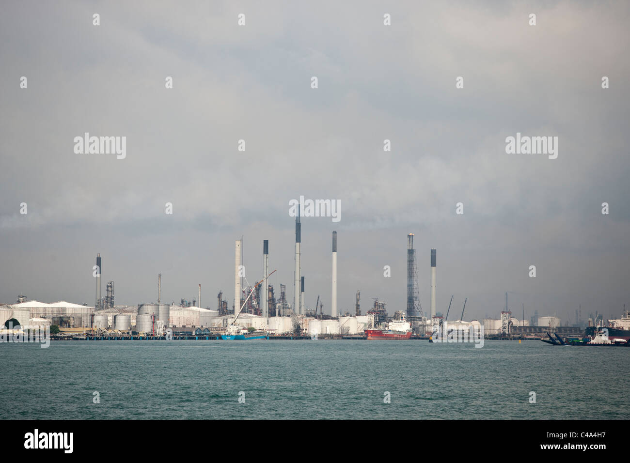 A view of an oil tank farm and an oil refinery on Jurong Island off the ...
