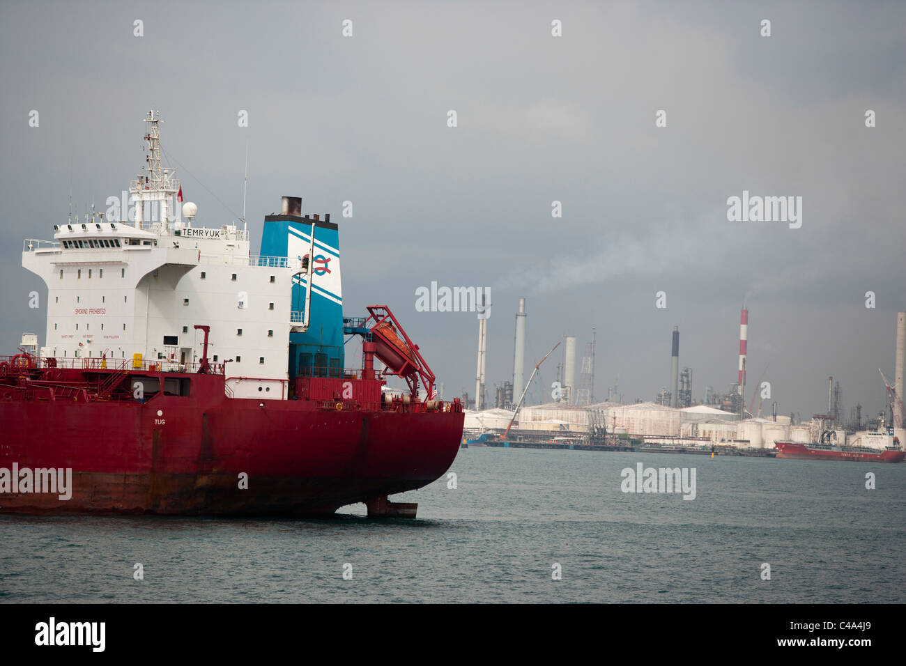 A view of an oil refinery on Jurong Island off the coast of Singapore ...