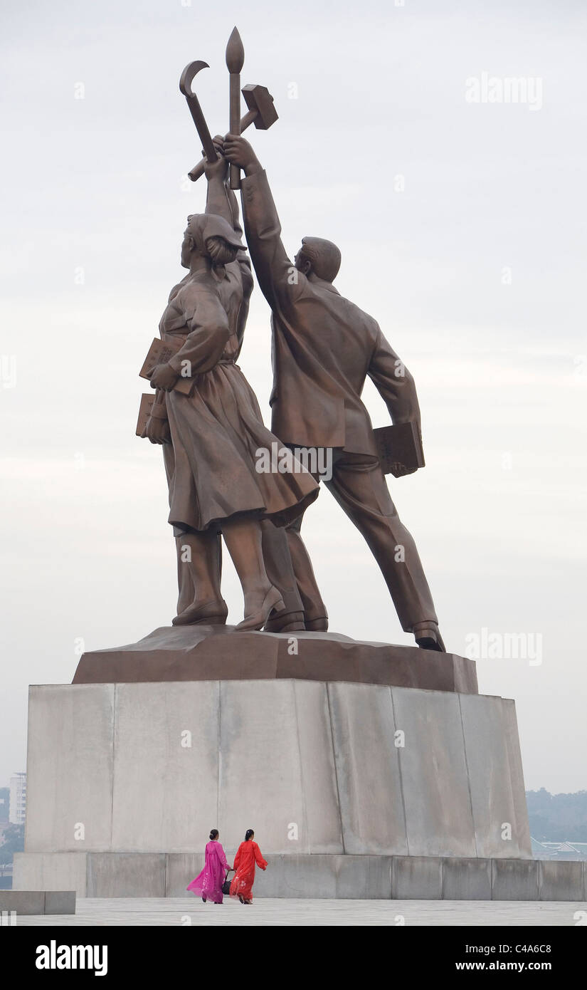 Statue at the base of the Tower of the Juche idea - Pyongyang, DPRK ...