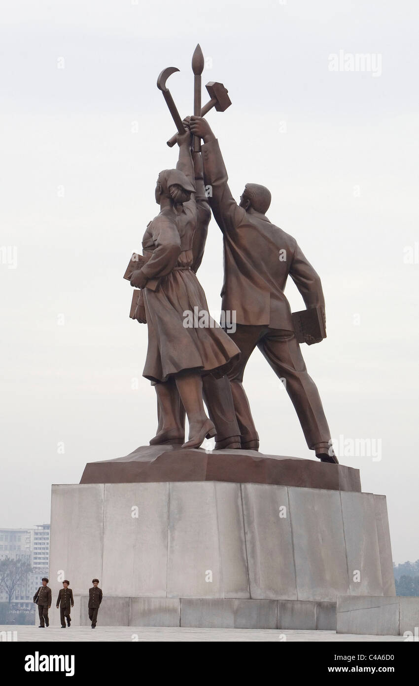 Statue at the base of the Tower of the Juche idea - Pyongyang, DPRK ...