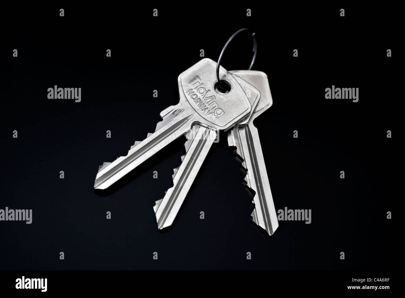 Set of new keys, black background. Macro Stock Photo - Alamy