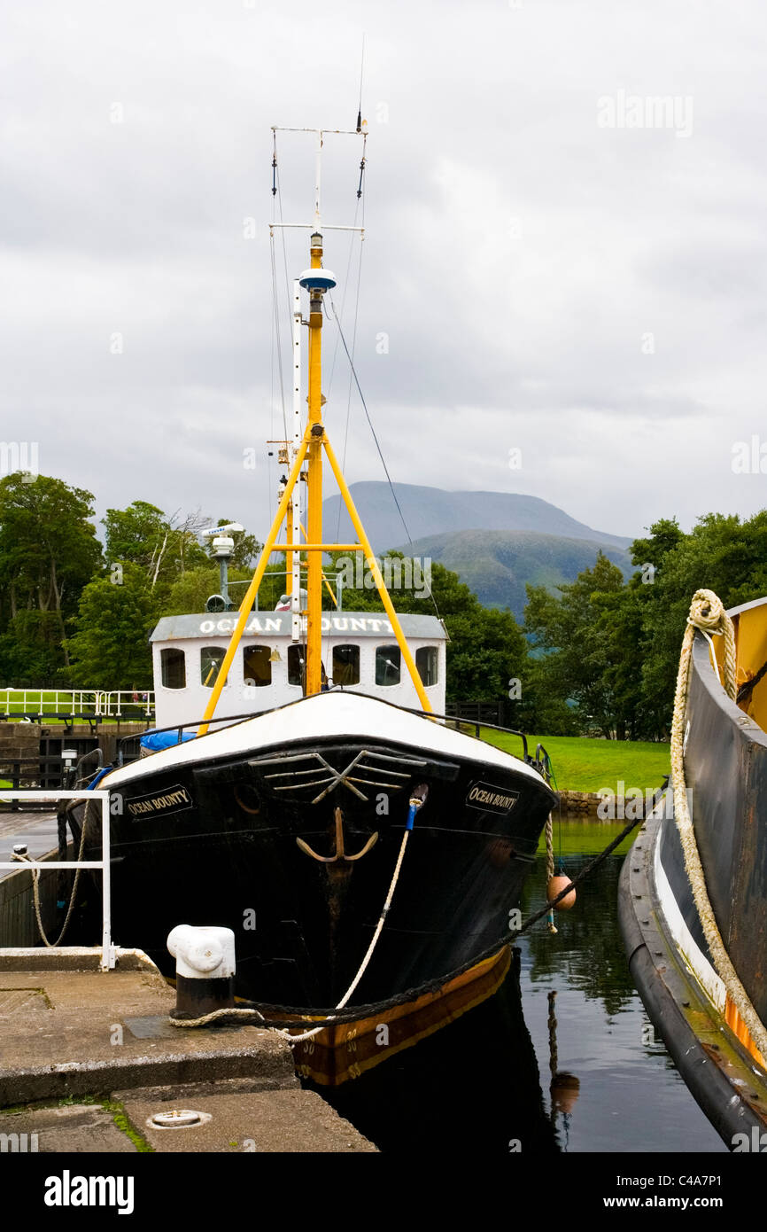 A boat moored on the Caledonian Canal at Corpach Basin near Fort ...