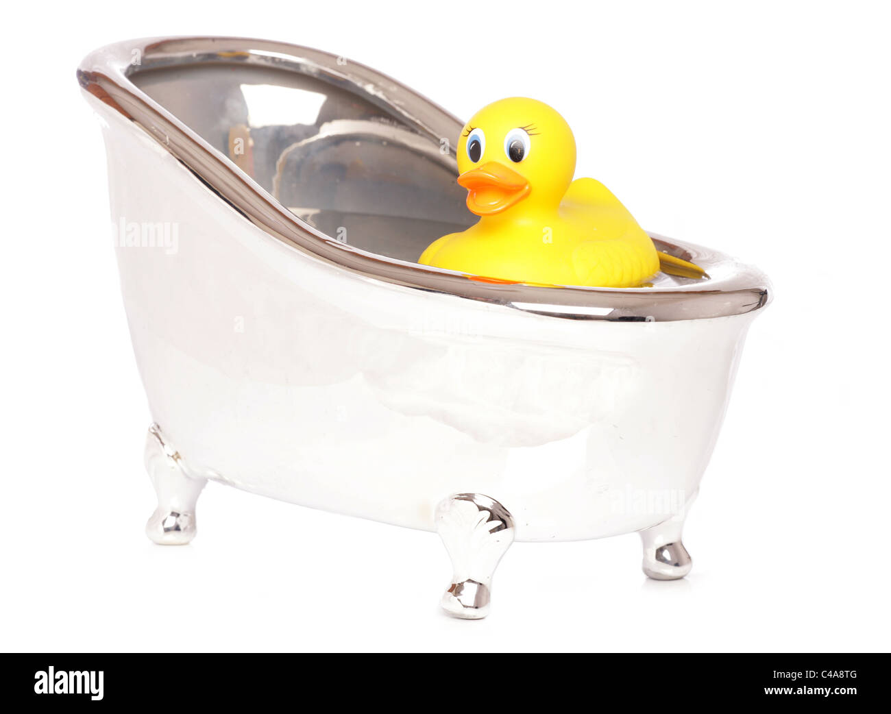 yellow rubber duck in a bath studio cutout Stock Photo - Alamy