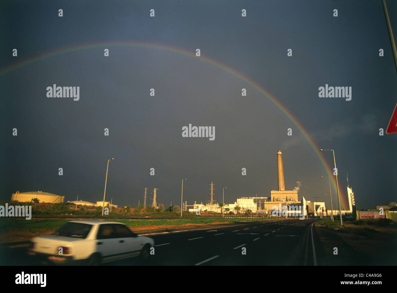Photograph of a rainbow over gray sky in northern Tel Aviv Stock Photo ...