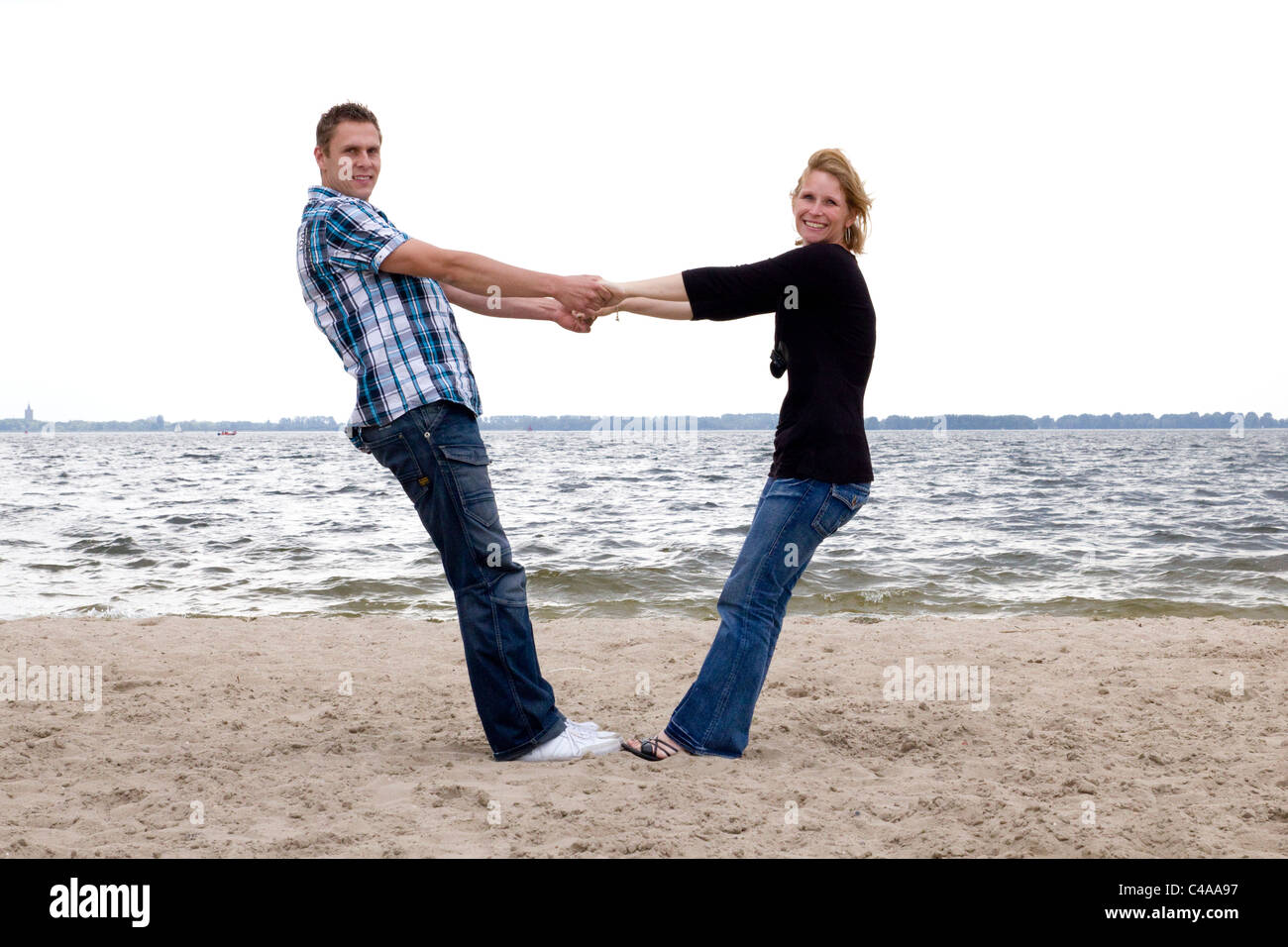 Holding band hi-res stock photography and images - Alamy