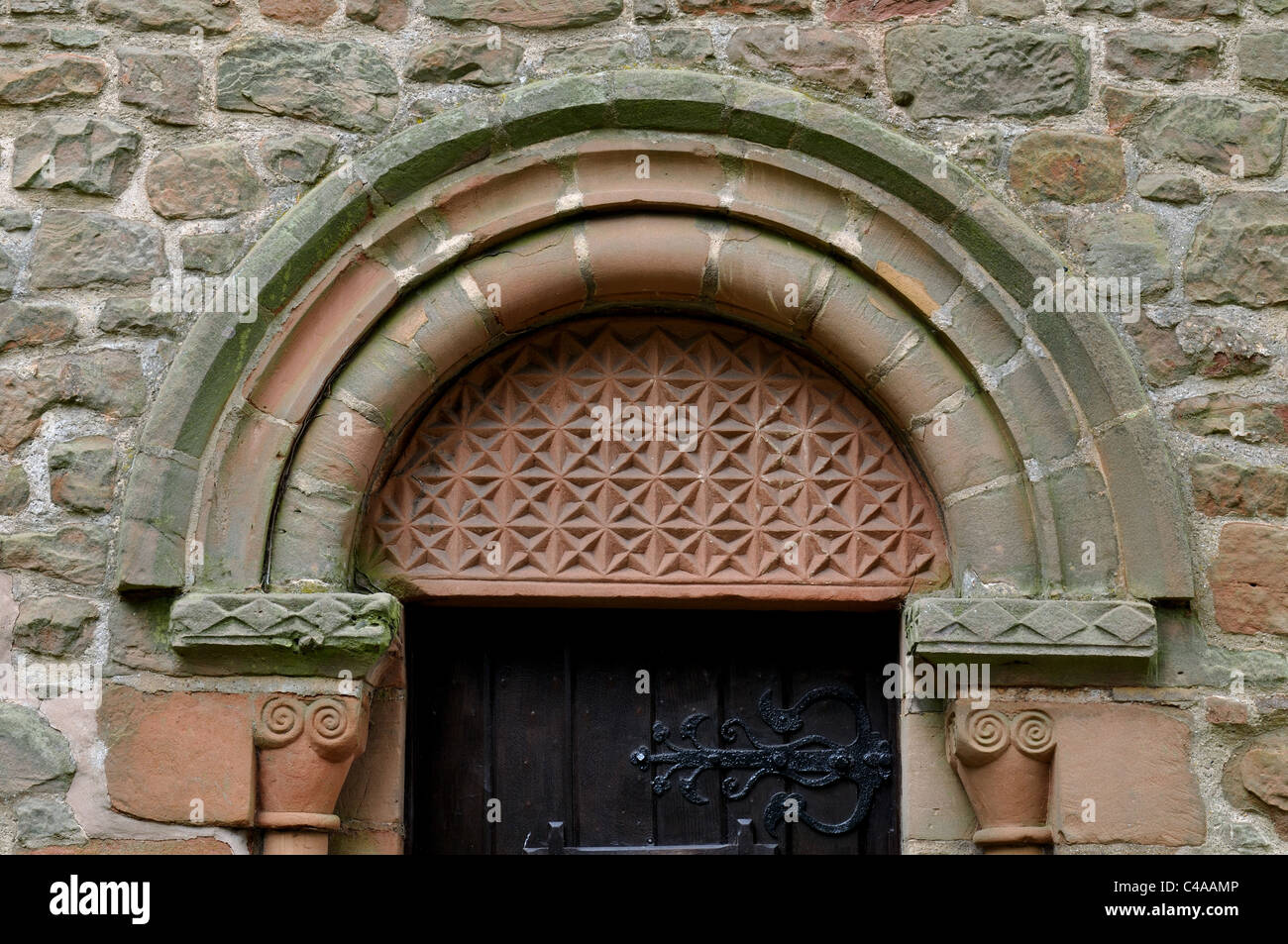 The Norman south doorway of Corley church, Warwickshire, England, UK ...
