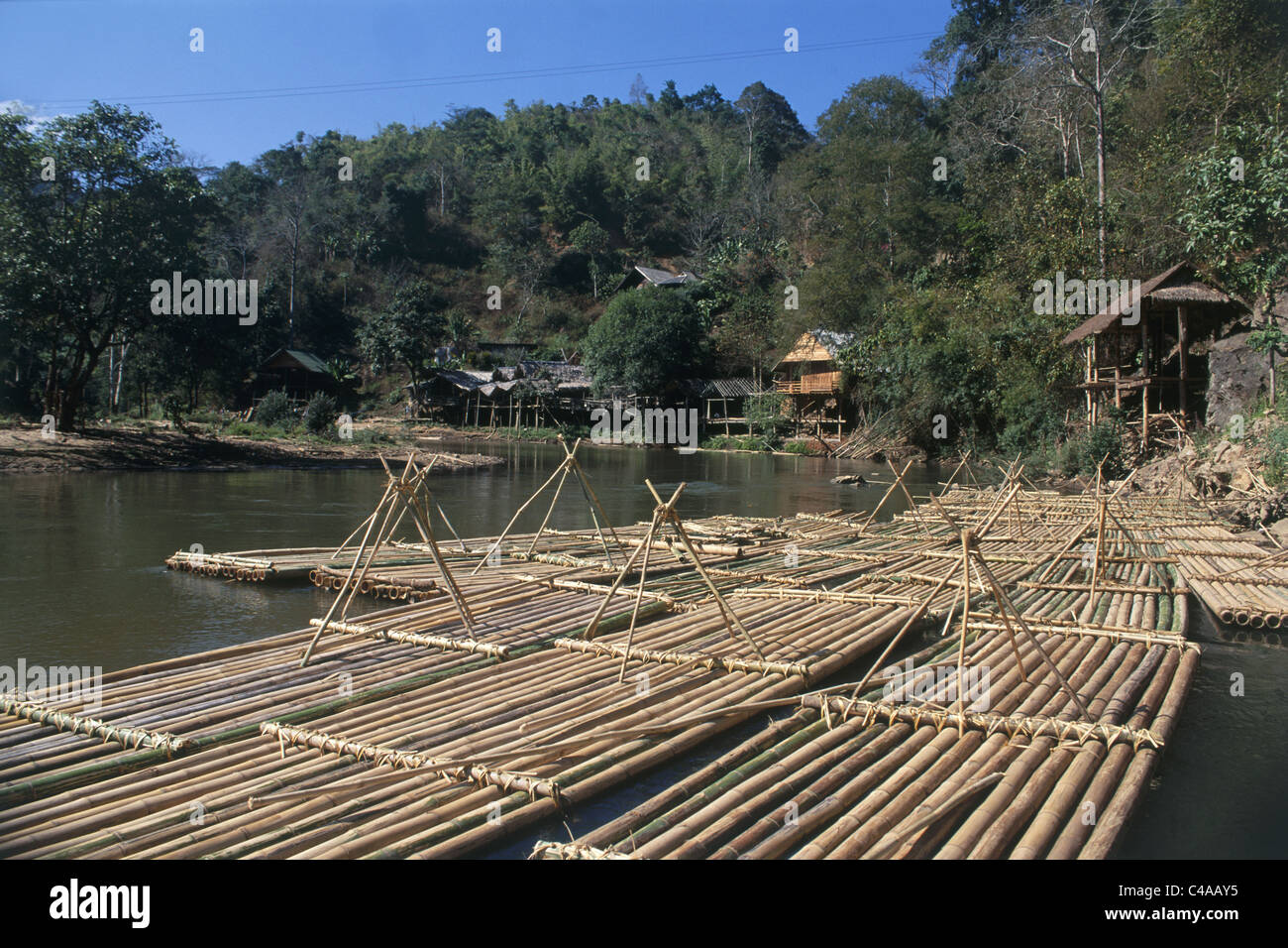 Photograph of small rafts on a river in Thailand Stock Photo - Alamy