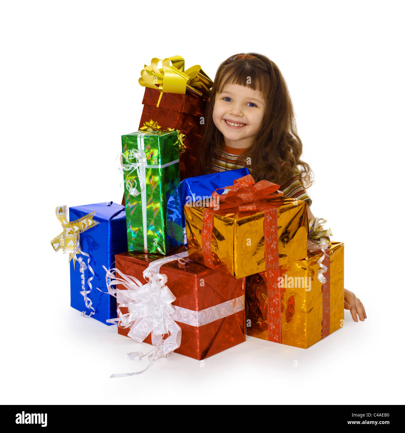 The happy child and the big heap of gifts on birthday Stock Photo - Alamy