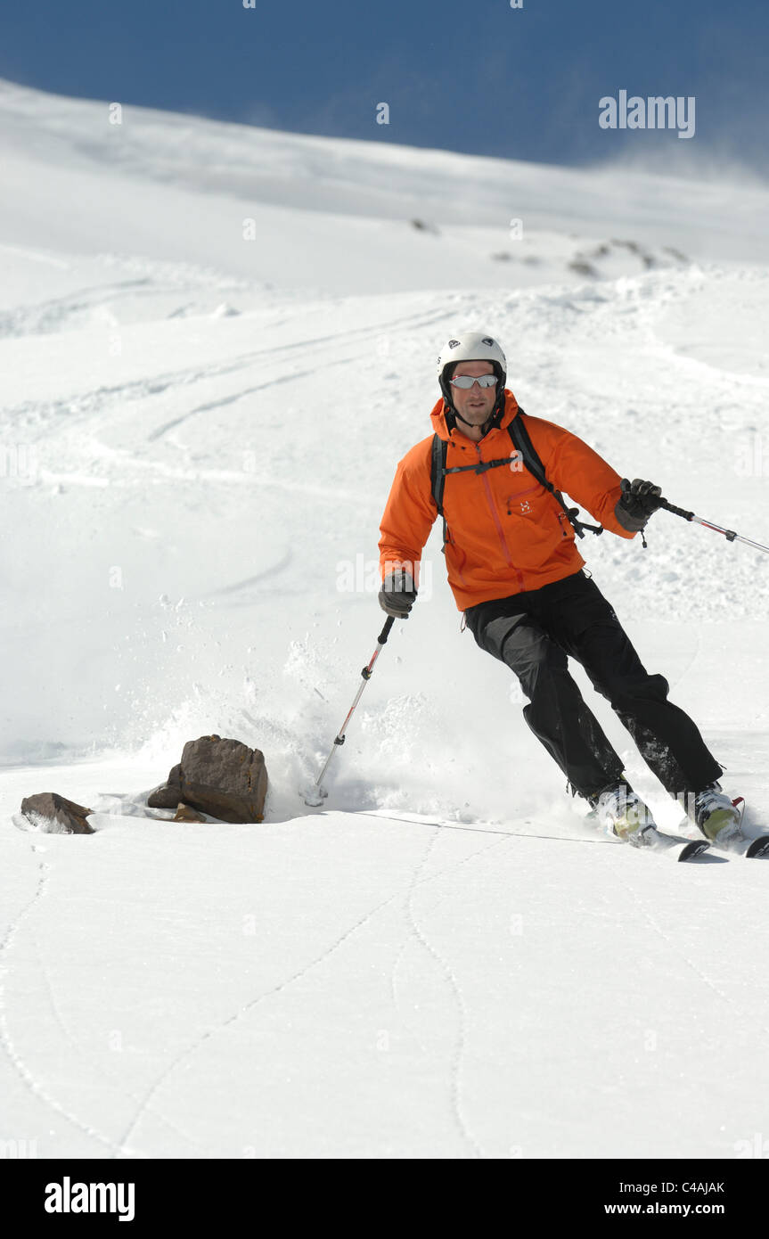 Man skiing wearing helmet off hi-res stock photography and images - Alamy