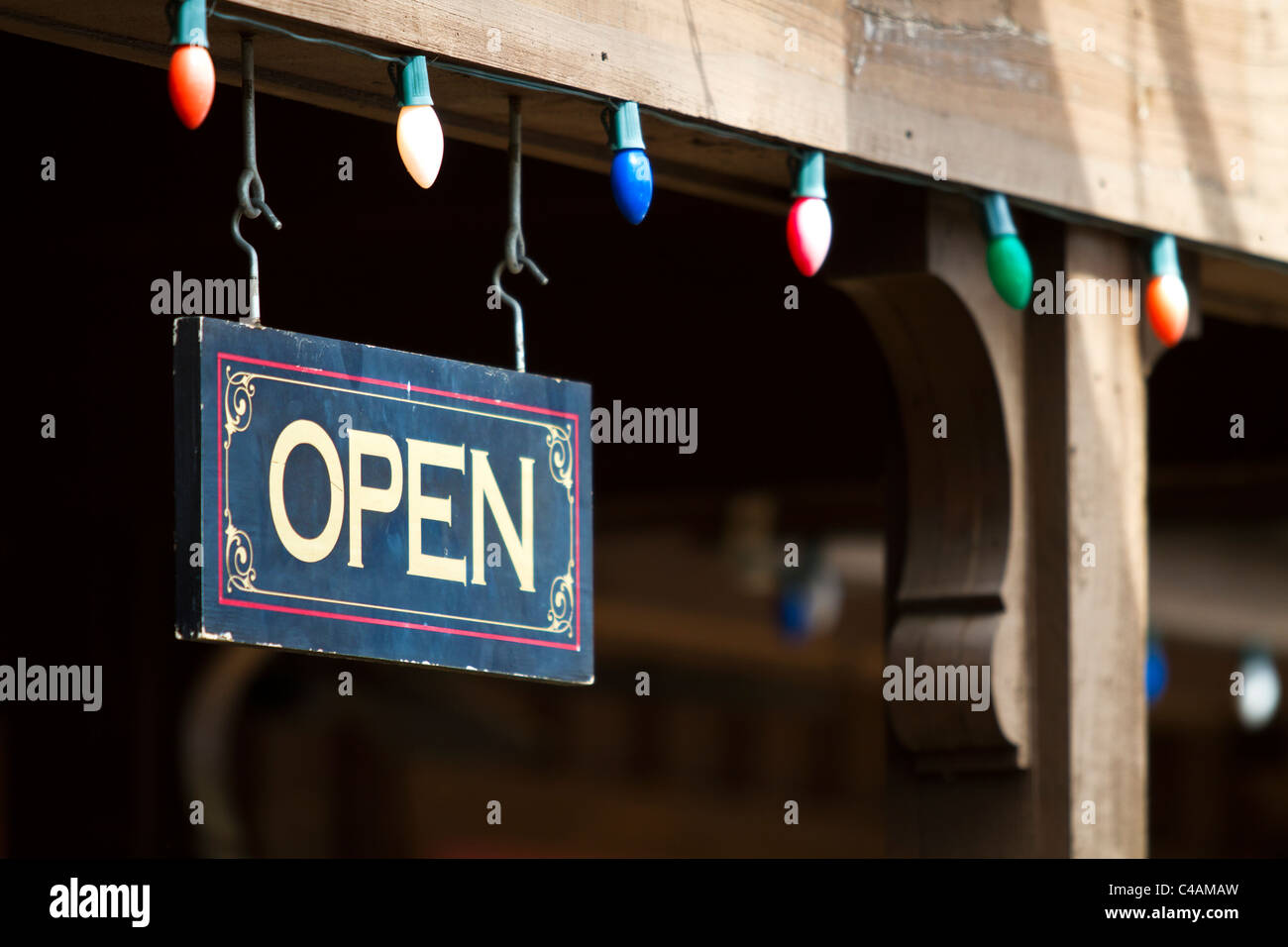 A hanging "open" sign Stock Photo - Alamy