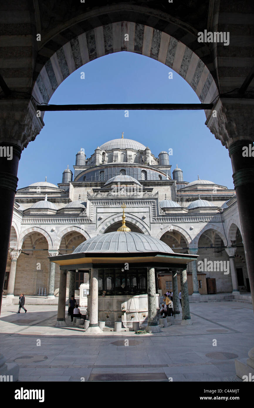 Courtyard of the Sultan Bayezid II Mosque through an arch in Istanbul ...