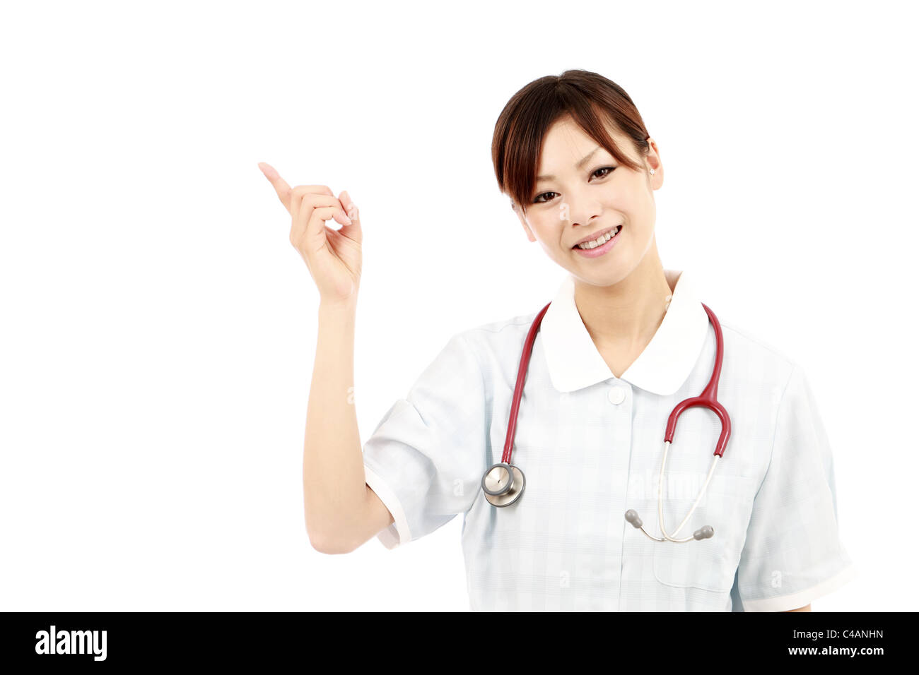 Young asian female nurse pointing Stock Photo - Alamy