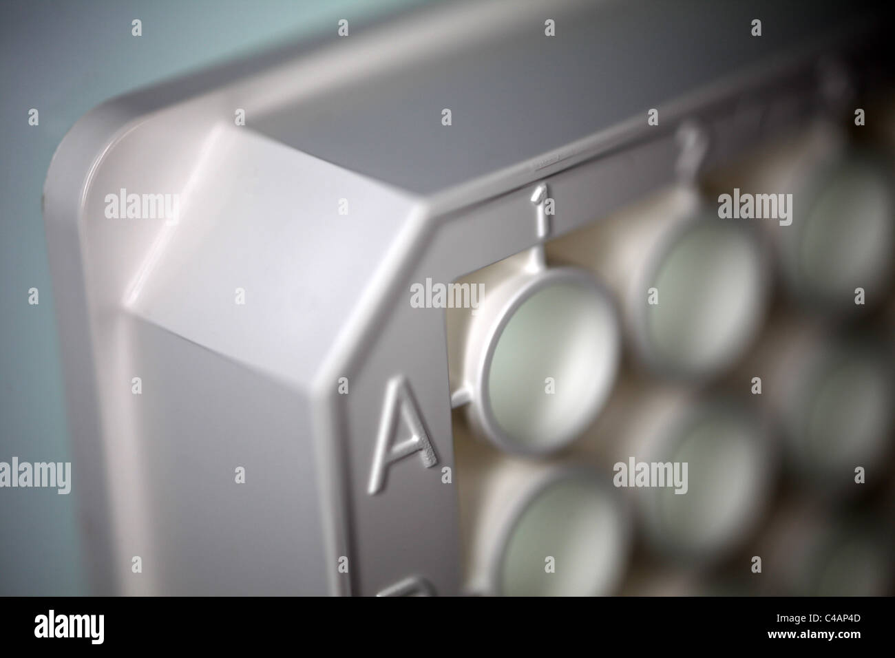 Close-up of a white plastic 96-well plate used for luminescence ...