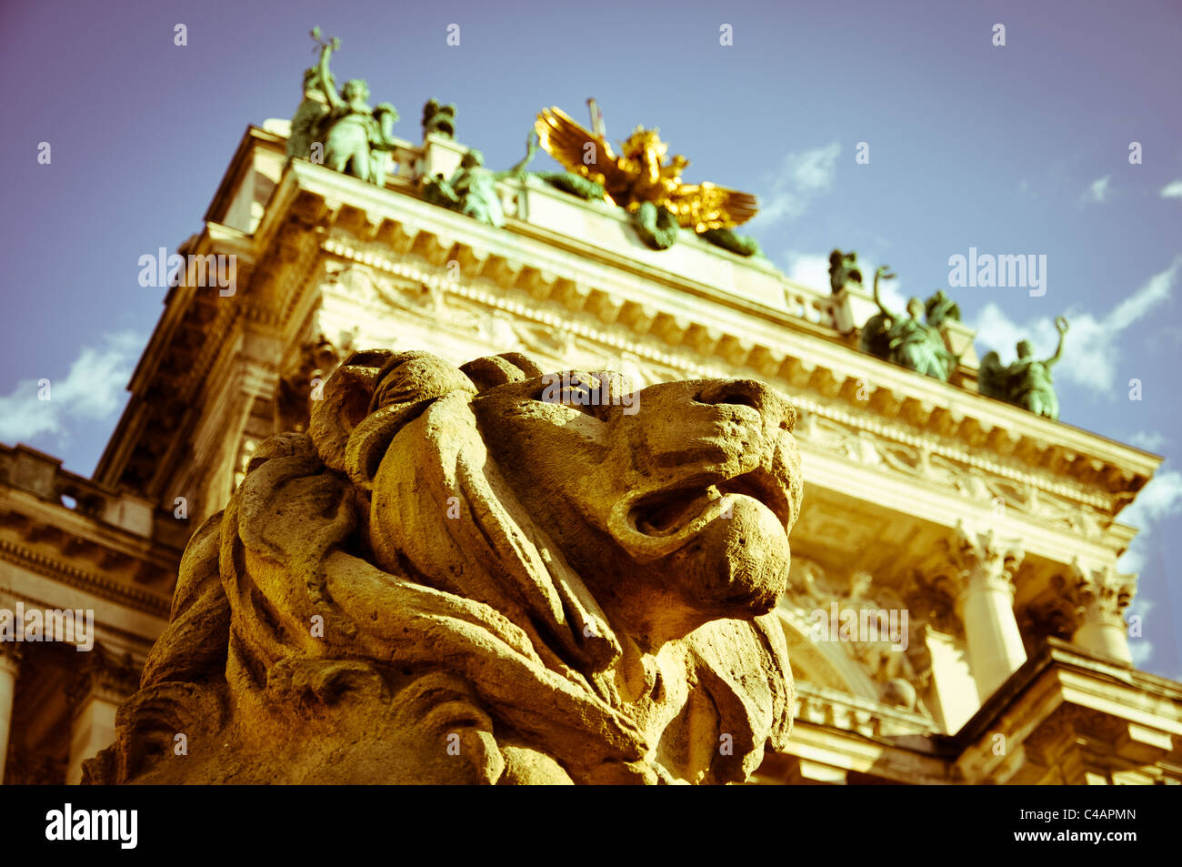 stone lion sculpture guarding vienna's national library with vintage ...