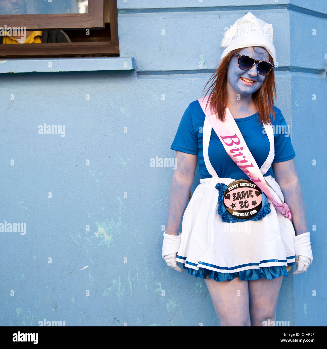A woman dressed as a blue smurf on a birthday party in Aberystwyth ...