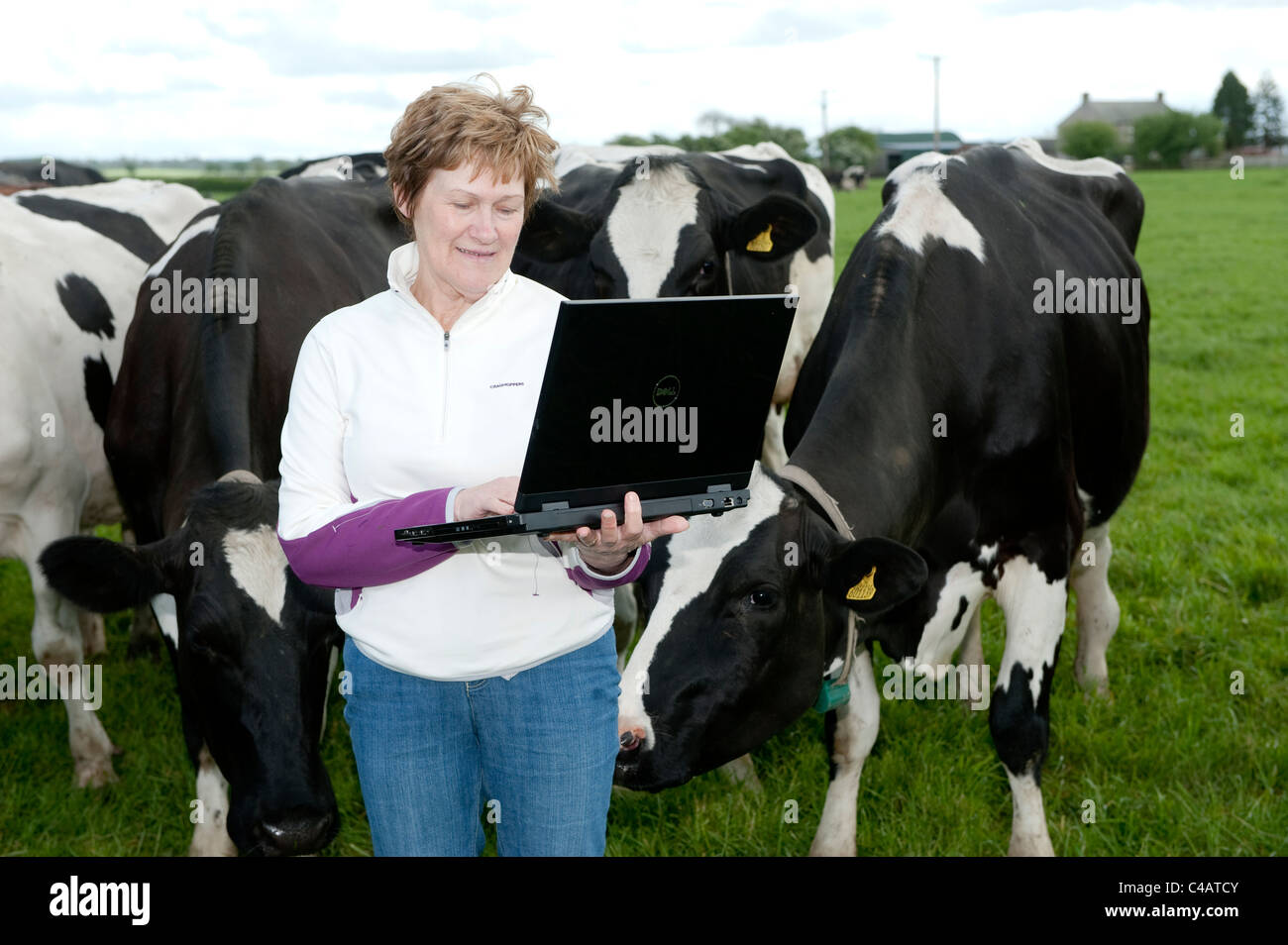 Woman with computer in a shed hi-res stock photography and images - Alamy