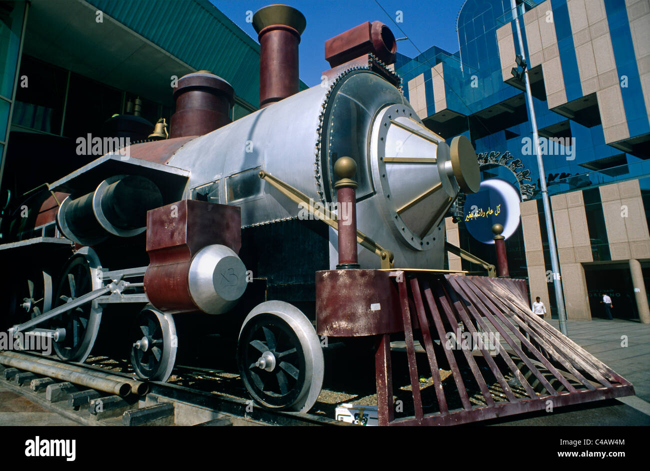 Saudi Arabia, Makkah, Jeddah. A mock steam engine projects from a ...