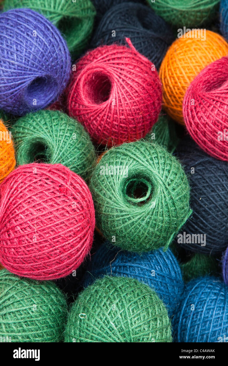 Bobbins of multicoloured gardening twine Stock Photo - Alamy