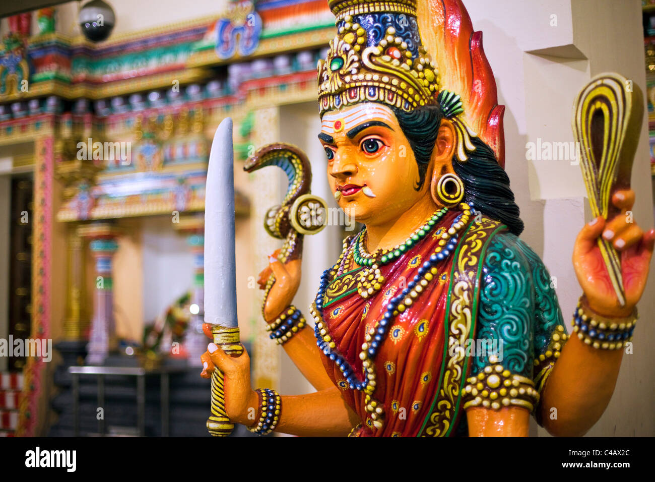 Singapore, Singapore, Chinatown. Hindu guardian statue at the Sri ...