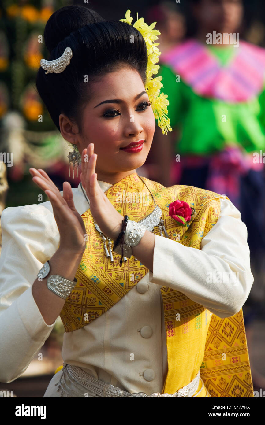 Thailand, Sakhon Nakhon, Sakhon Nakhon. Fawn Thai dancer performing ...