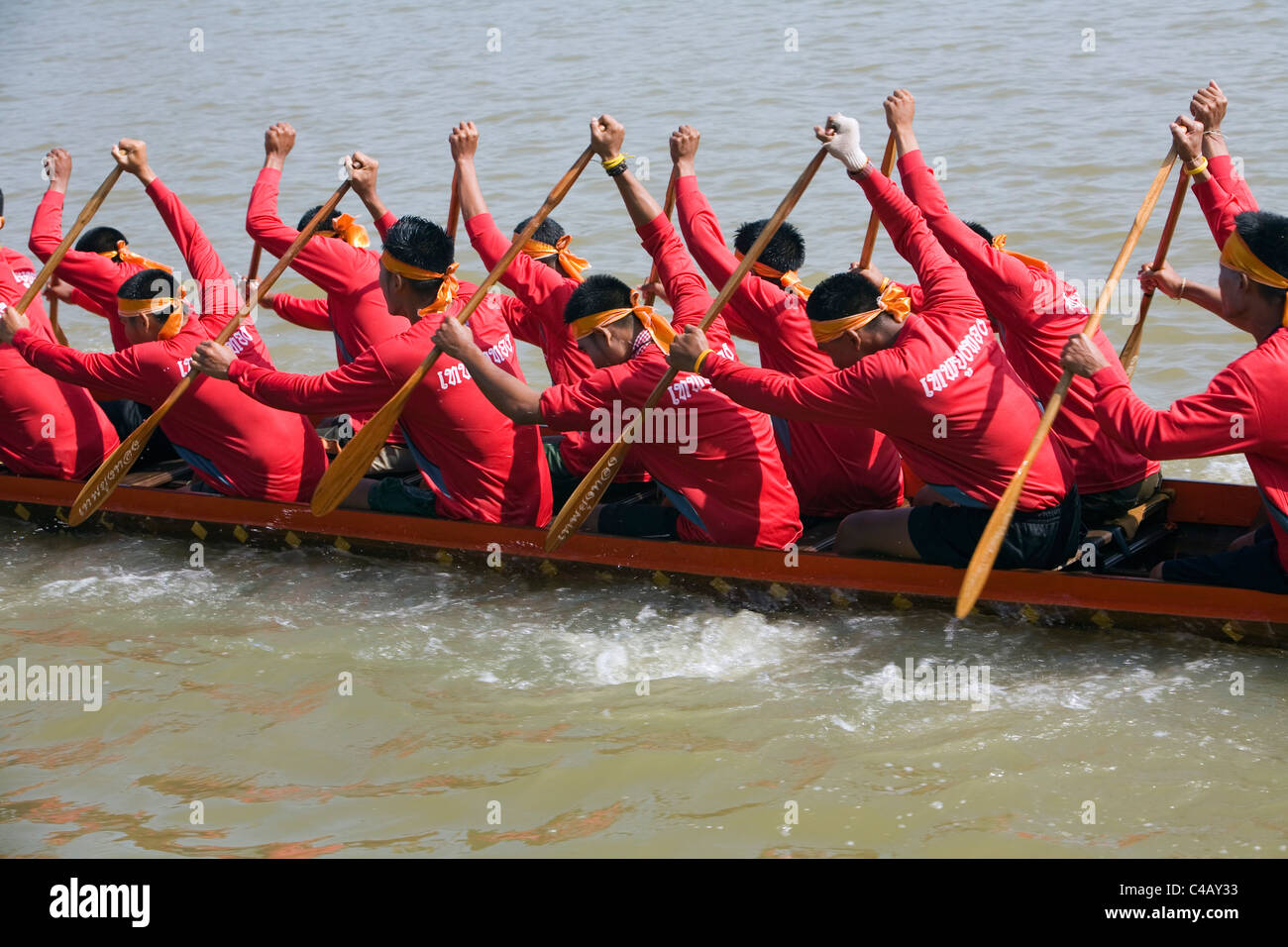 Thailand, Nakhon Ratchasima, Phimai. Longboat team racing at the Phimai ...
