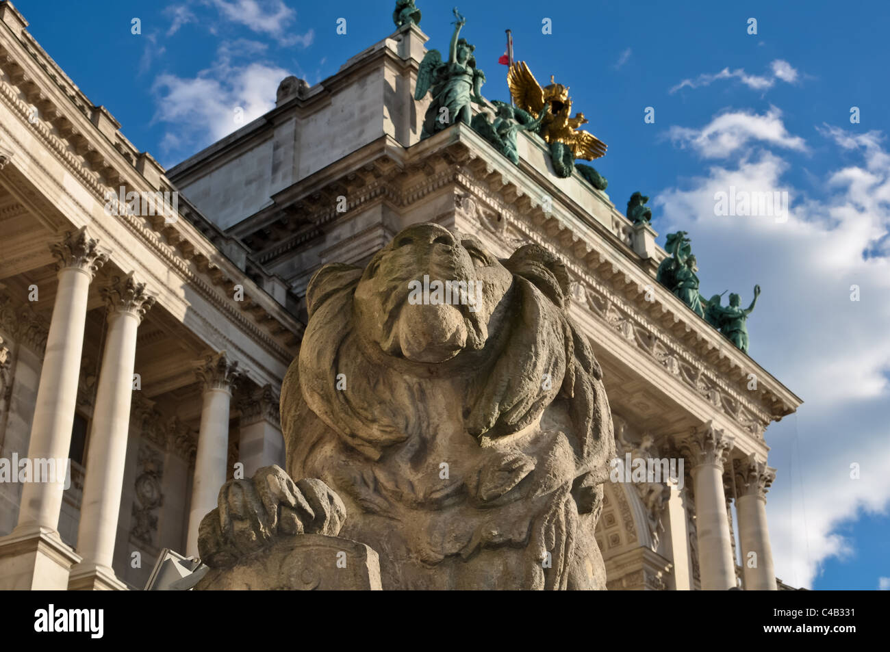 stone lion sculpture guarding vienna's national library Stock Photo - Alamy