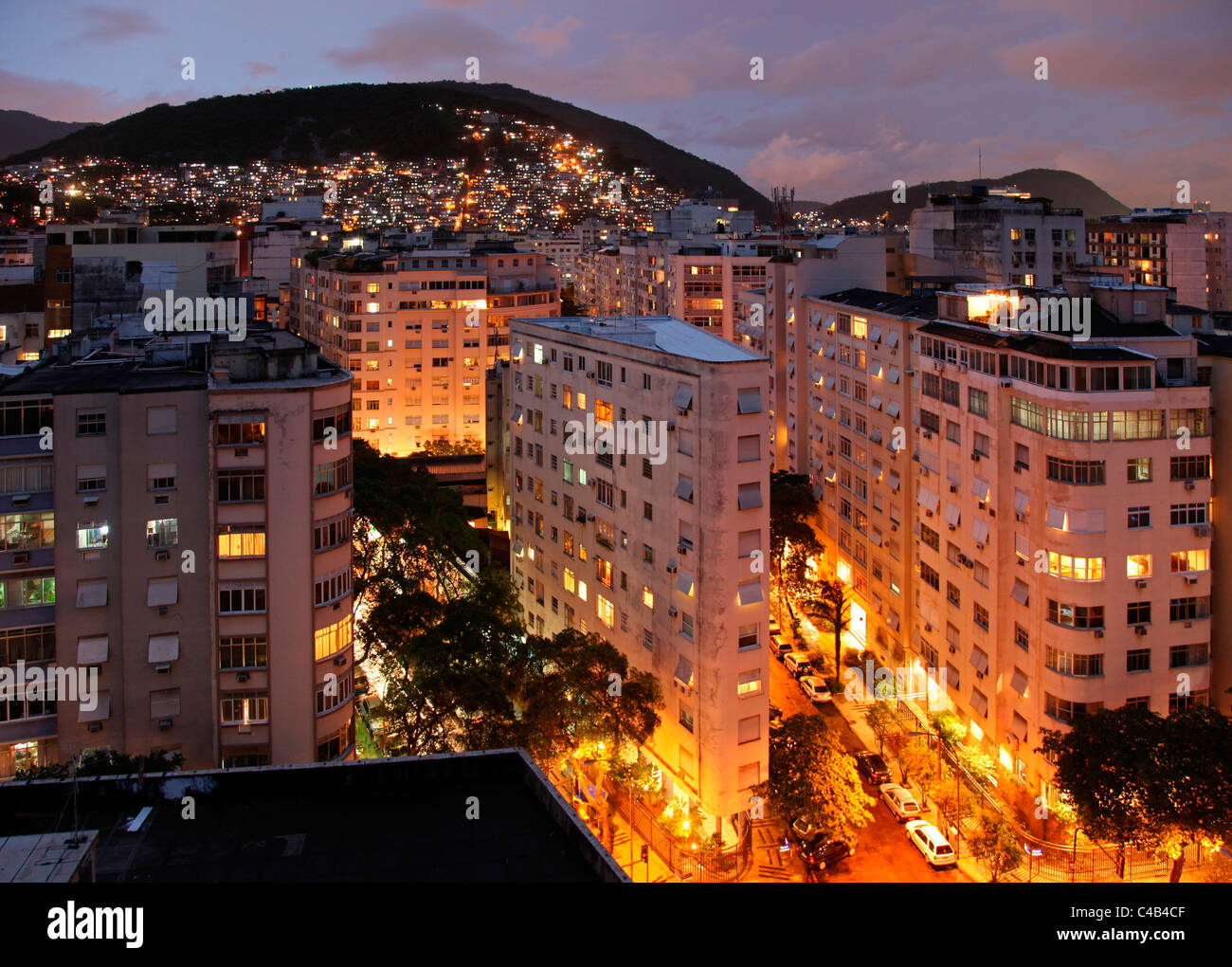 Bird's eye view on Ipanema at dusk with Favela in the background on the ...