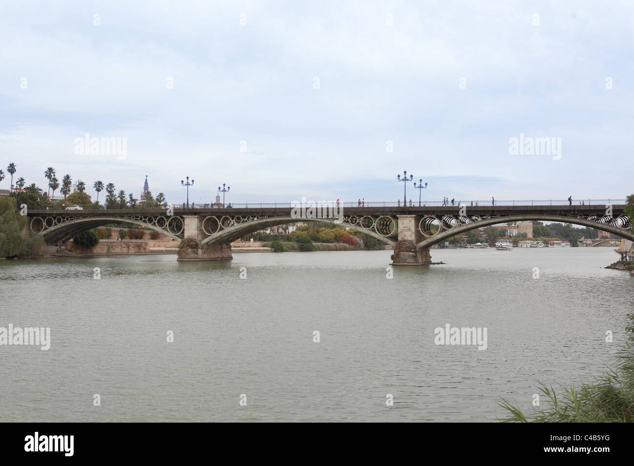 Seville bridge "Puente Isabel II Stock Photo - Alamy