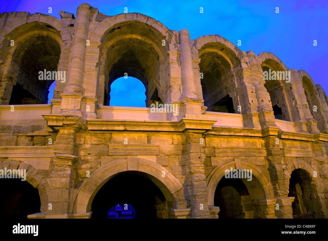 Arles; Bouches du Rhone, France; Detail of arches of the historical Amphitheatre in evening ...