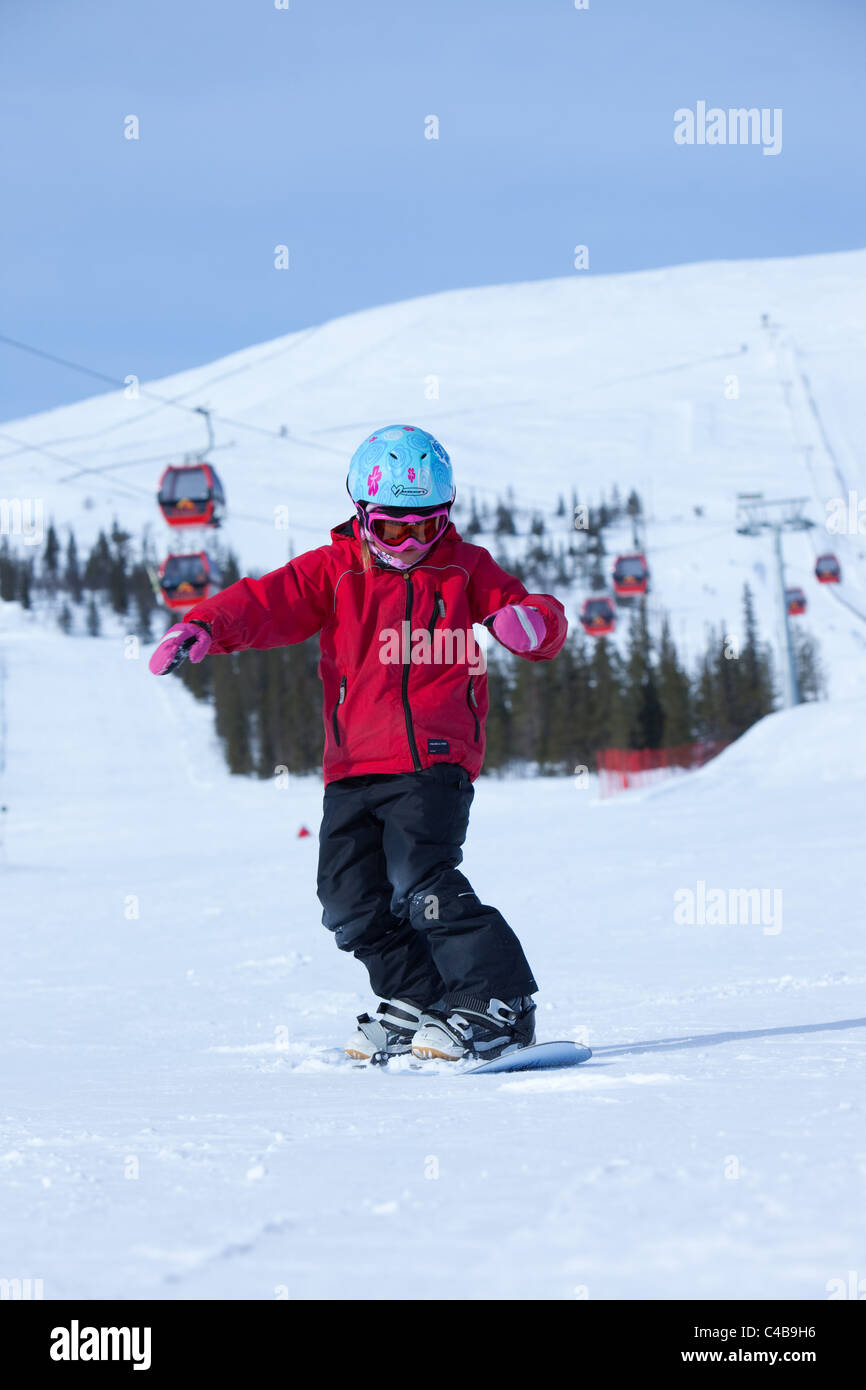 Girl snowboarding in Lapland, Ylläs, Finland Stock Photo - Alamy